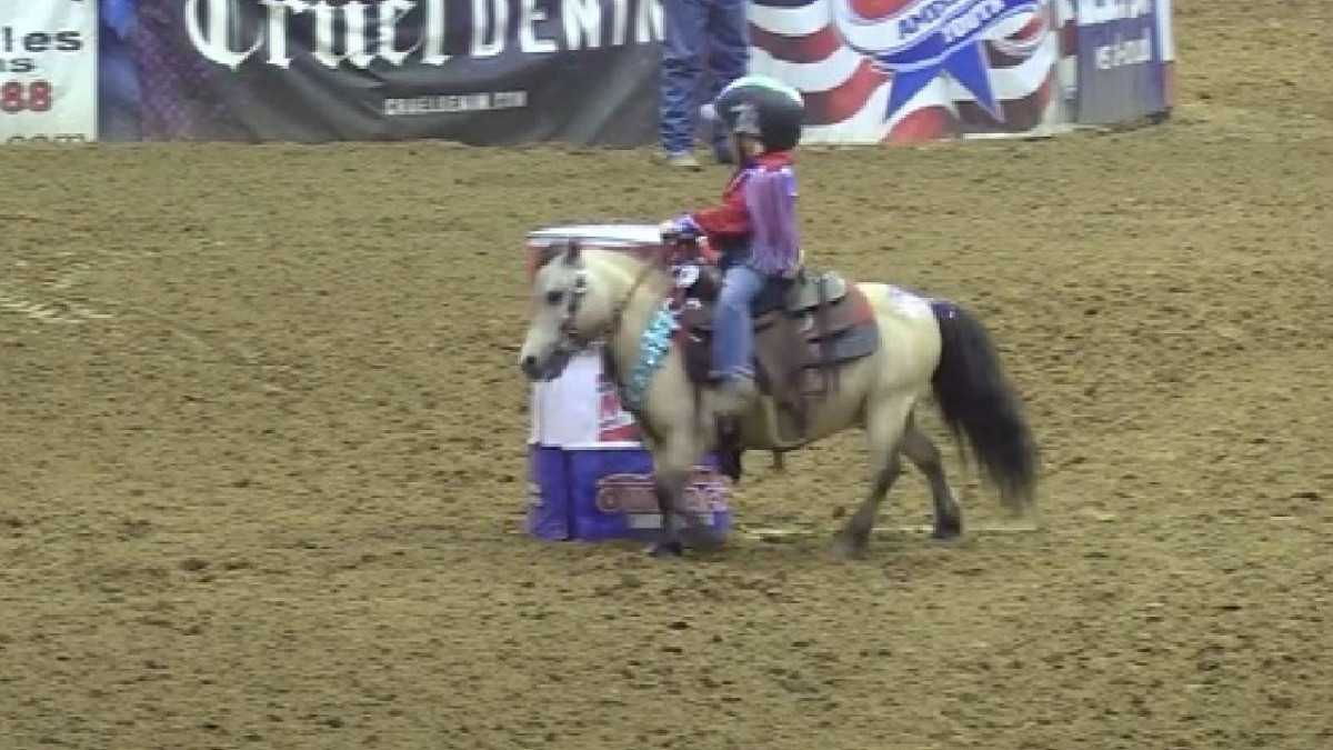 Little Girl Competes In Barrel Racing On Pony - PBR Notices